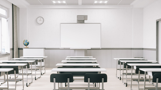 Interior of an empty modern classroom with interactive whiteboard ...